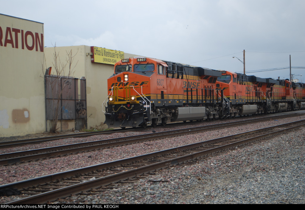 BNSF 6807 Leads a Grain Train through City of Colton on the UP connection to the UP Colton Yard.